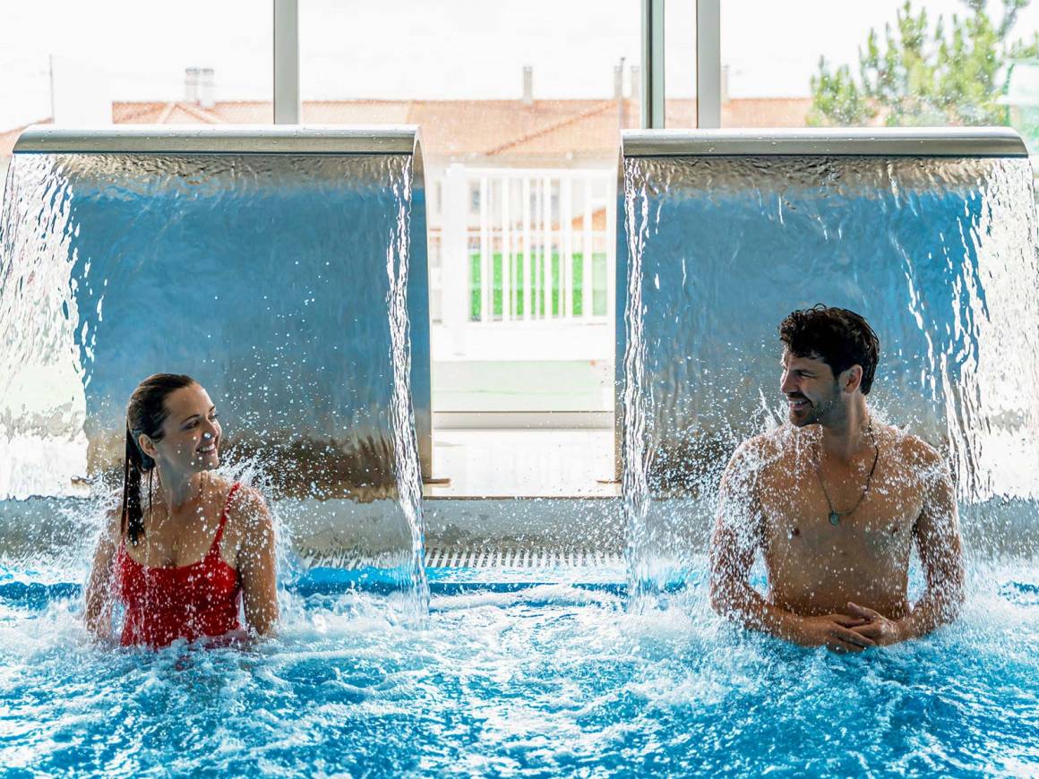 The indoor swimming pool and water park at the Colina do Sol campsite ...